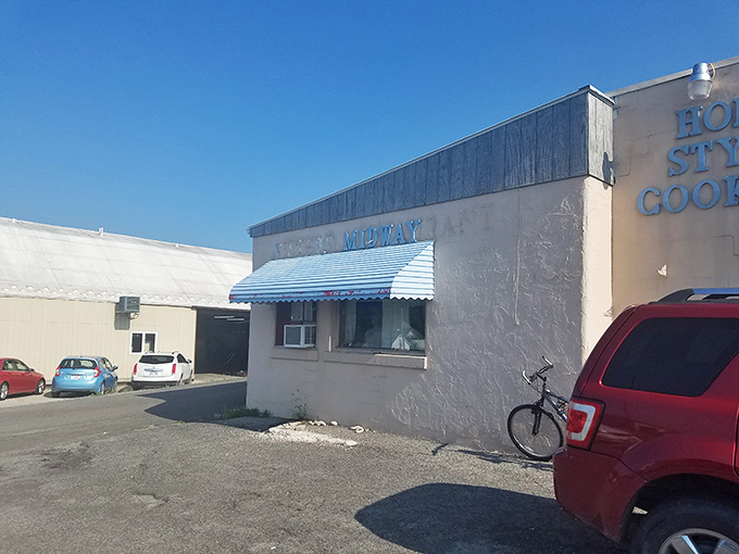 The blue awning signals sanctuary for hungry travelers like a culinary lighthouse guiding you to flavor's shore.