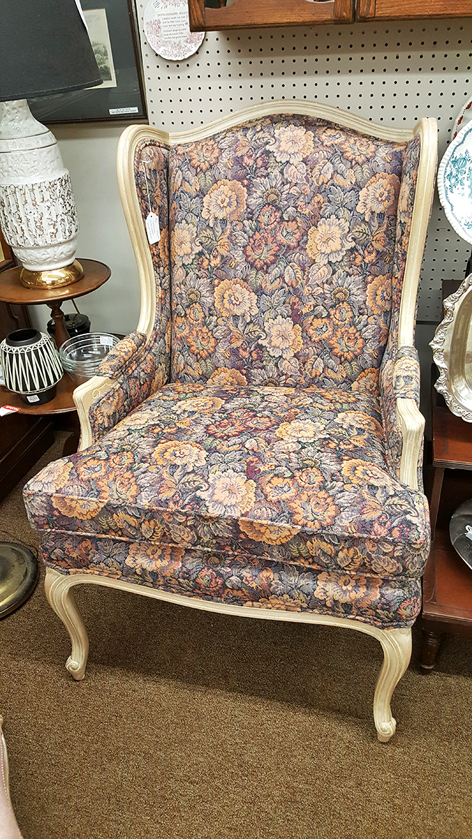 That wingback chair isn't just furniture&mdash;it's a throne waiting for someone who appreciates the regal comfort of floral upholstery.