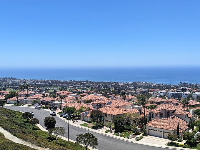 San Clemente's Spanish Colonial charm radiates through red-tiled roofs and white stucco buildings by the sea.