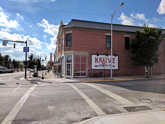 A sunny corner in Bellefontaine where locals grab coffee, stroll downtown, and enjoy the charm of small-town Ohio life.