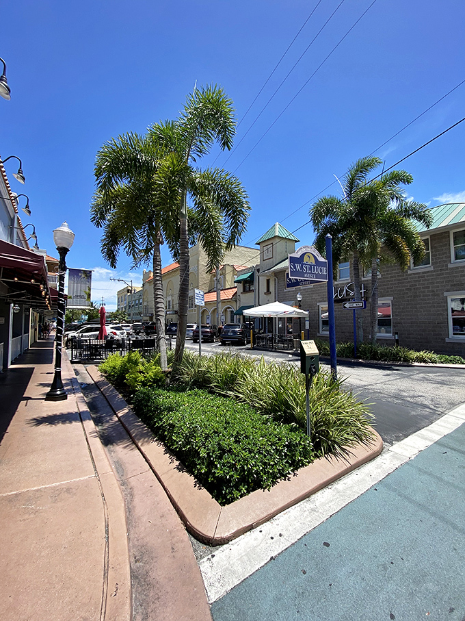 Stuart's downtown intersection blooms with tropical flair&mdash;where palm-studded traffic islands make even waiting for the light change feel like paradise.