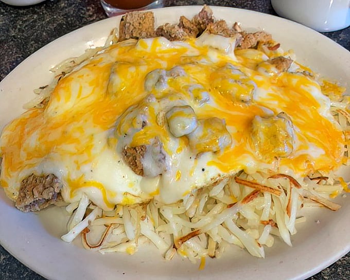 The legendary "5 Car" breakfast&mdash;named because you'll need five cars to tow you home after finishing this cheese-smothered masterpiece of excess.