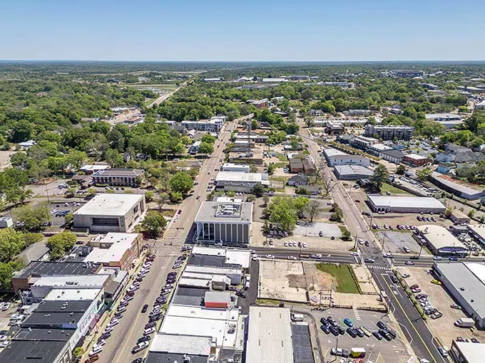 From above, Starkville reveals its perfect balance of green space and urban planning, a community designed for living rather than just existing.