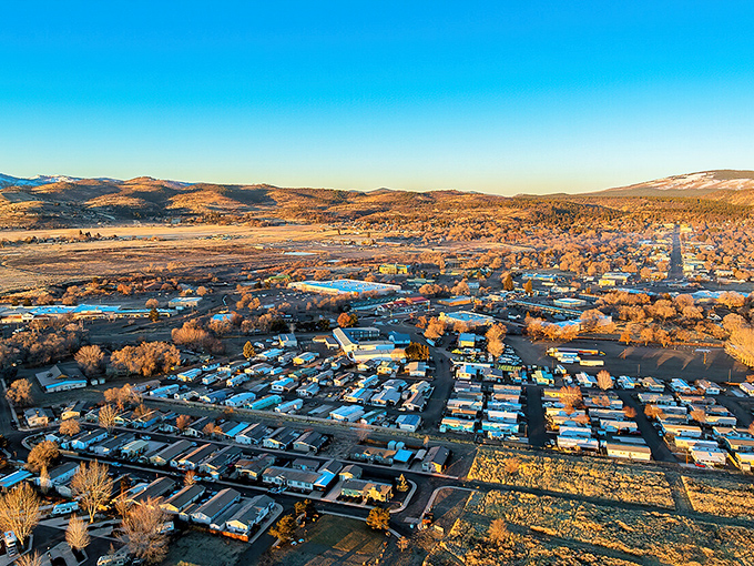 Sunset paints Susanville gold in this aerial view, proving affordable California living can still come with spectacular scenery.