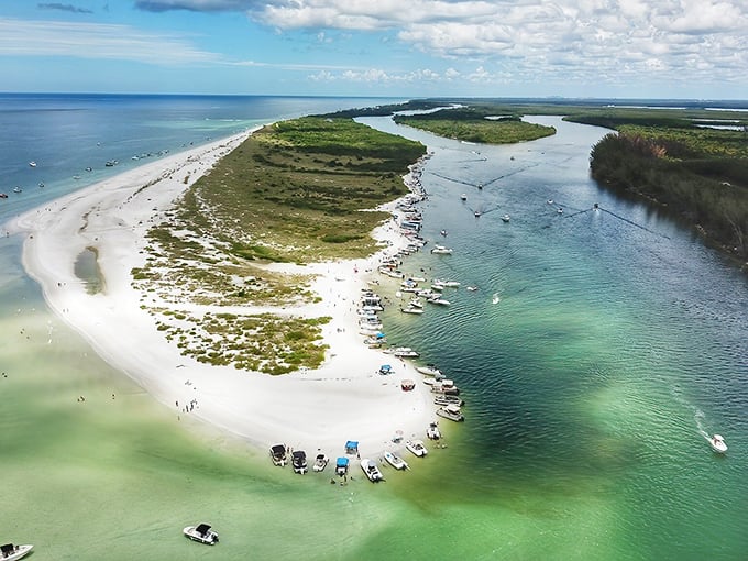 The bird's-eye truth: Keewaydin Island is a sliver of white-sand perfection, with boats dotting its shores like colorful confetti.