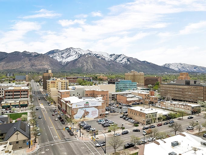 An aerial view reveals Ogden's perfect positioning&mdash;urban amenities nestled against mountain wilderness, offering the best of both worlds without Manhattan prices.