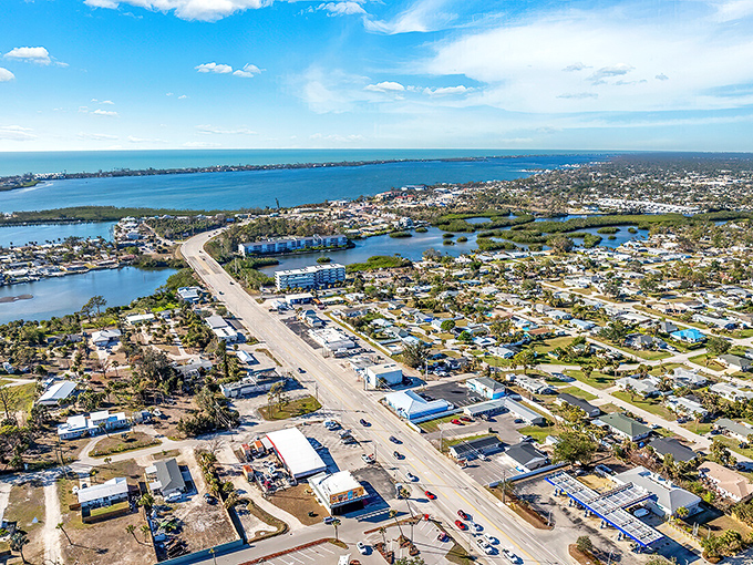 The big picture reveals Englewood's perfect balance. Water access, modest homes, and natural beauty create a community where $2,200 a month isn't just surviving—it's thriving in paradise.