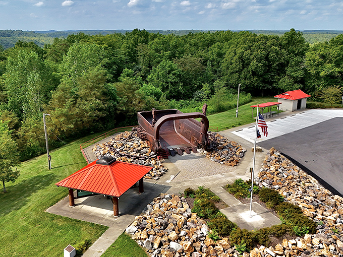 From above, the bucket becomes the centerpiece of a thoughtfully designed memorial park, nestled in the very landscape it once reshaped.