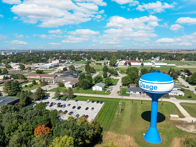 The iconic blue water tower stands sentinel over Osage&mdash;a beacon of small-town pride visible from miles across the prairie.