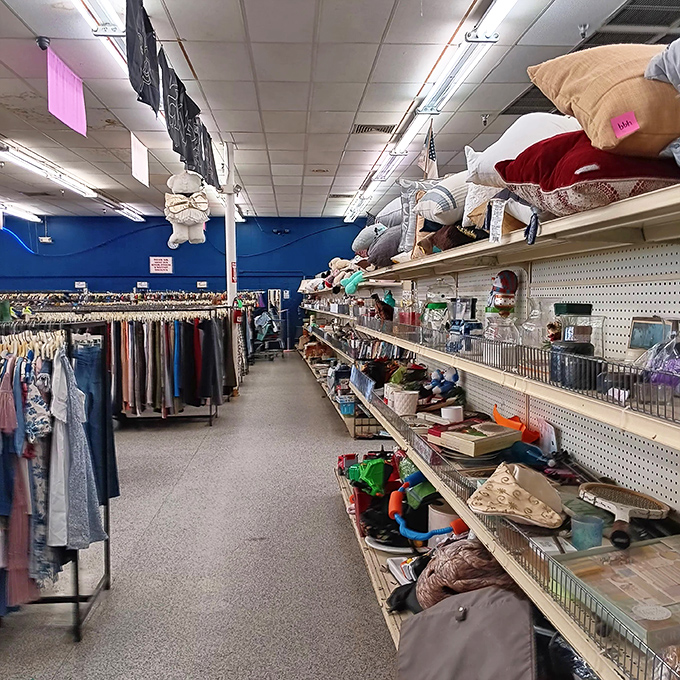 An aisle that promises adventure: clothing on the left, household curiosities on the right, surprises everywhere.