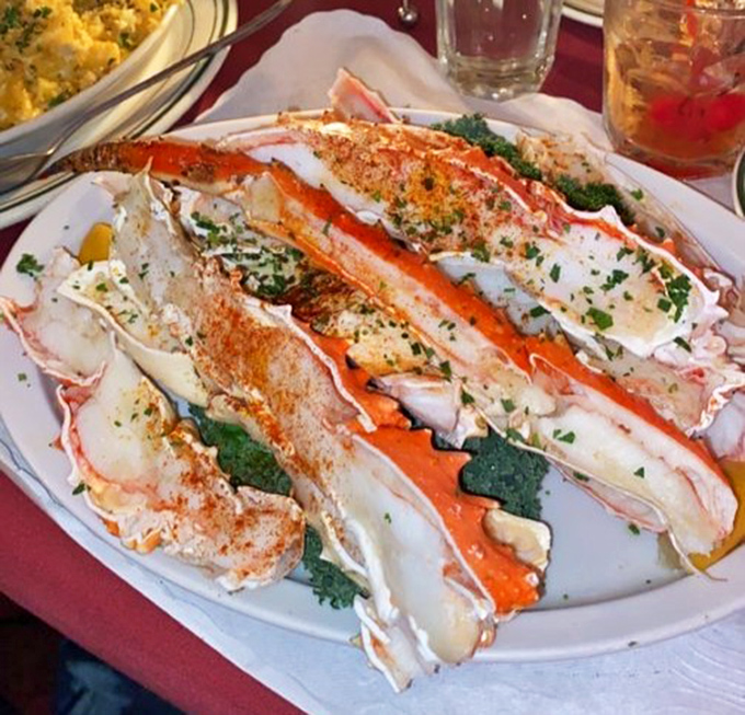 Alaskan king crab legs so impressive they need their own zip code. The kind that make neighboring tables point and say "I'll have what they're having."