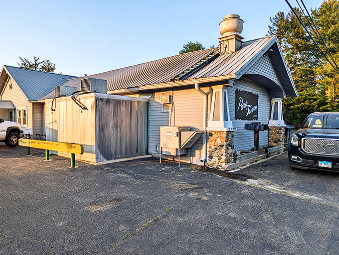 Alexander Park Tavern might not look like much from the outside, but as any food traveler knows, the most memorable meals often hide behind the most modest doors.