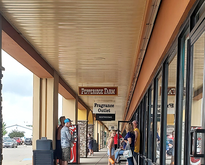 The covered walkways of Birch Run protect dedicated shoppers from Michigan's unpredictable weather. Shopping waits for no rainstorm!