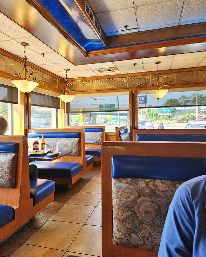 Blue vinyl booths bathed in natural light&mdash;the classic diner seating arrangement that somehow makes everything taste just a little bit better.