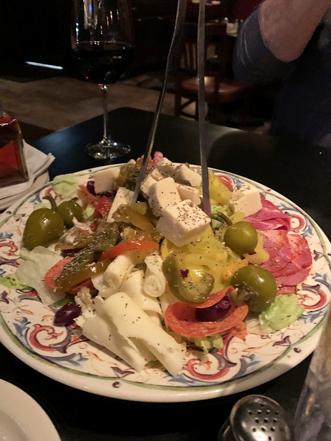 An antipasto plate that's basically a Mediterranean vacation on china. Olives, cheeses, and cured meats playing together in perfect harmony.