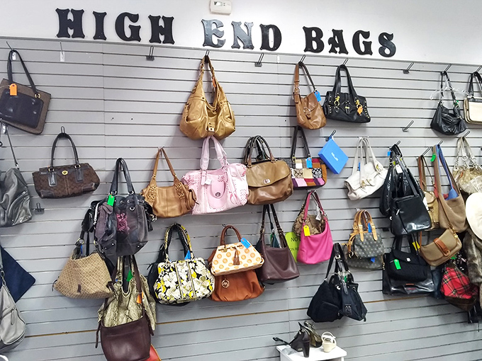 The "High End Bags" wall&mdash;where designer purses get their second chance at love with a new shoulder to ride on.