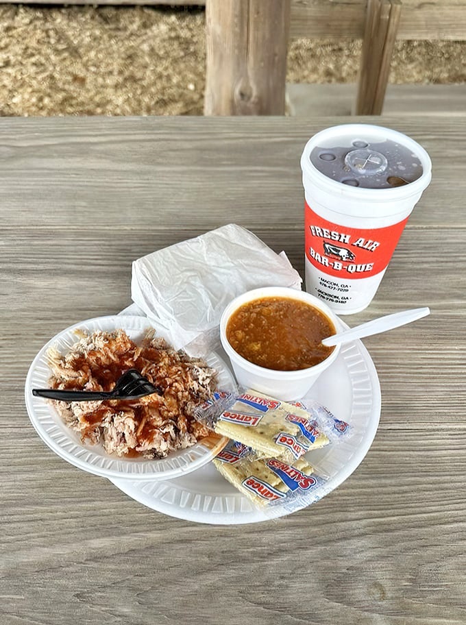 The perfect barbecue trifecta &ndash; chopped pork, Brunswick stew, and crackers. Some meals don't need fancy plates to change your life.