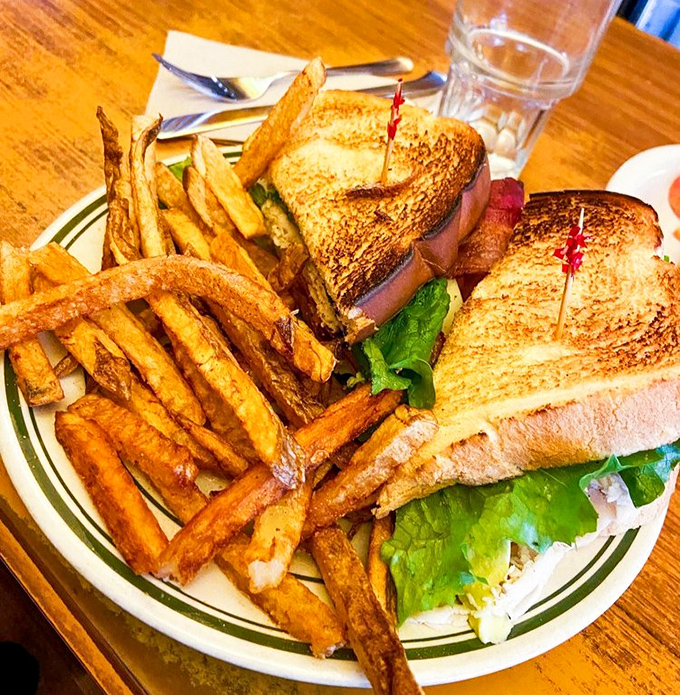 The classic club sandwich with hand-cut fries &ndash; proof that lunch at Western Caf&eacute; delivers the same no-nonsense deliciousness as their famous breakfasts.