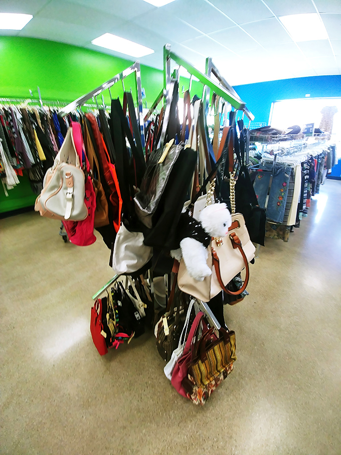 The handbag junction where fashion meets function. Designer lookalikes mingle with authentic vintage pieces in this hanging garden of accessory possibilities.