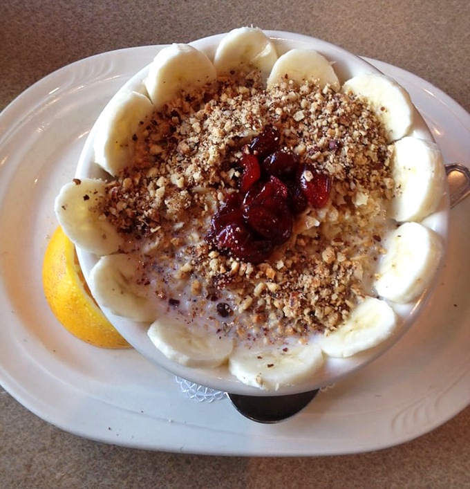 Oatmeal gets the VIP treatment with a crown of sliced bananas, crunchy nuts, and a dollop of fruit compote. Healthy never looked so tempting.
