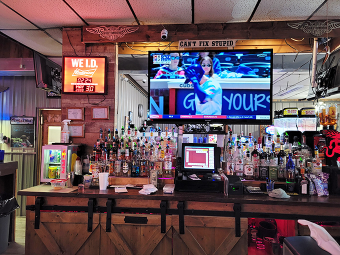 The bar stands ready for action, with enough bottles to suggest they take their liquid courage as seriously as their food.