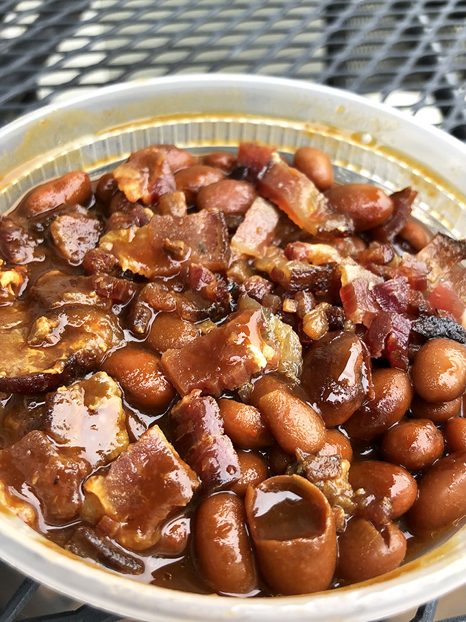 Beans that have clearly been introduced to pork and had a meaningful relationship. This isn't just side dish &ndash; it's a supporting actor worthy of an Oscar.