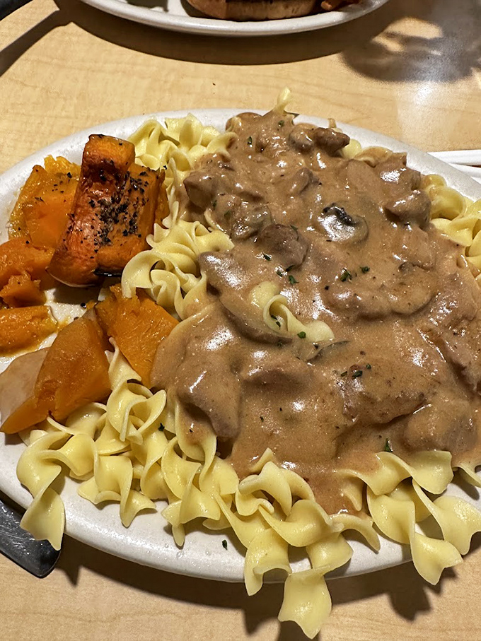 Beef stroganoff that means business&mdash;tender meat and mushrooms in a rich sauce, blanketing egg noodles with buttery squash standing guard on the side.