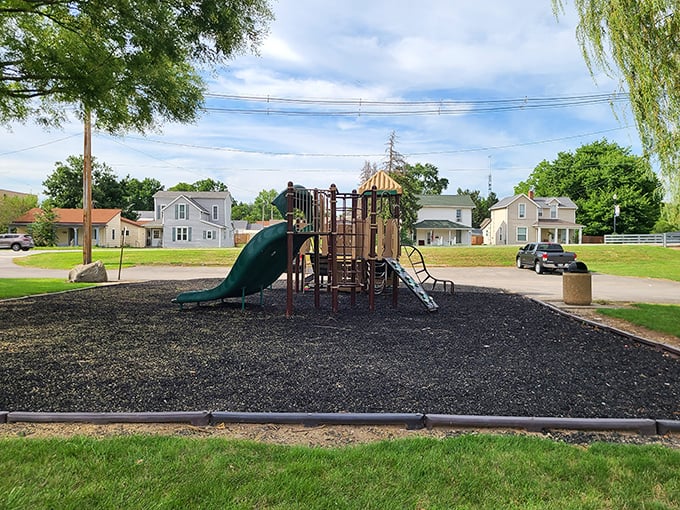 Belcher Park reminds us that childhood's simple pleasures&mdash;a slide, swings, and open sky&mdash;still create the magic that no video game can match.