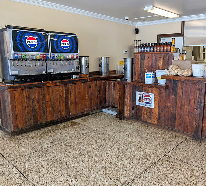 The drink station&mdash;where sweet tea flows like liquid sunshine, ready to cut through the vinegar tang and pork fat with refreshing Southern grace.