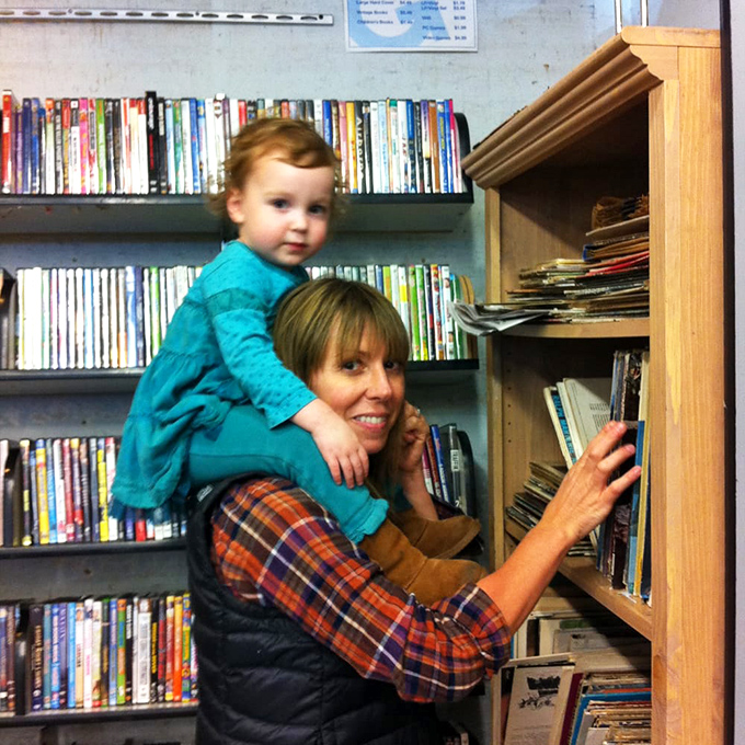 The media section: where forgotten DVDs and paperbacks get second chances, and parents introduce kids to the ancient art of page-turning.