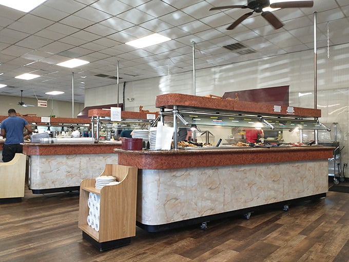 The buffet line&mdash;where decisions are made, friendships are tested, and the phrase "I'll just have a little of everything" becomes a mathematical impossibility.