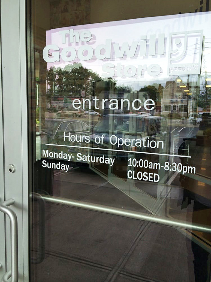 The hours of operation sign&mdash;crucial information for planning your thrifting expedition to this bargain hunter's paradise in Elmwood Park.