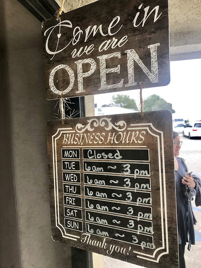 These business hours are basically saying, "Yes, we're closed Mondays because even comfort food legends need a day off."