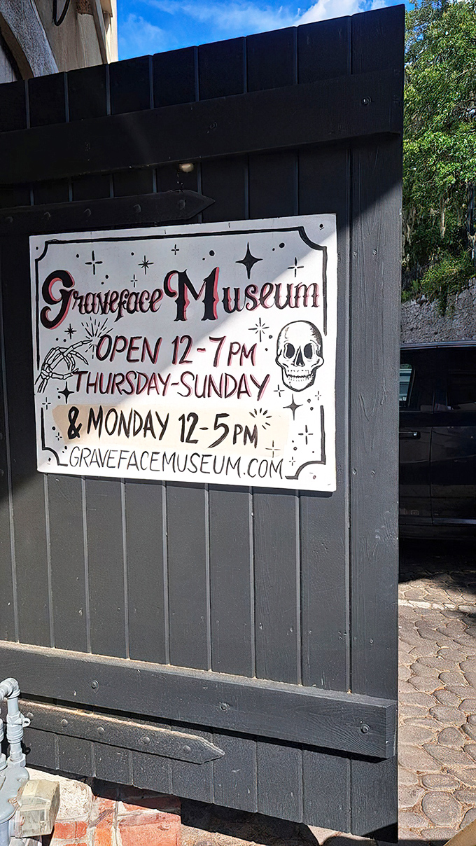 Even the hours sign maintains the museum's aesthetic. Open Thursday through Sunday and Monday, because even the macabre needs a weekend.