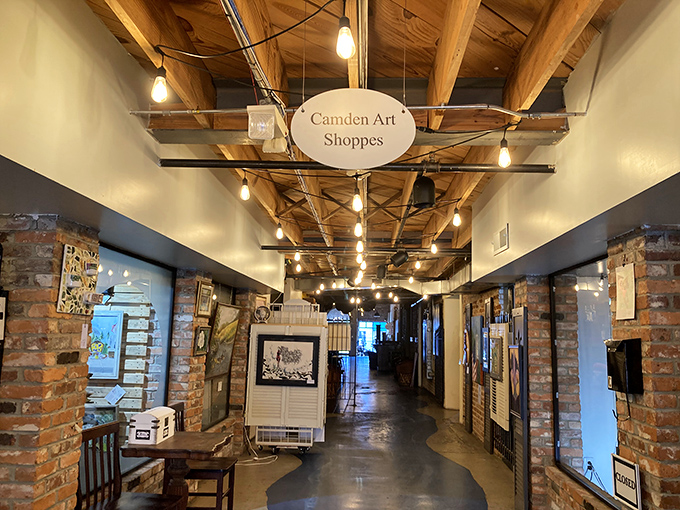 Camden Art Shoppes' exposed brick and wooden beams create a gallery where creativity isn't just displayed&mdash;it's structurally necessary, like support columns for the soul.