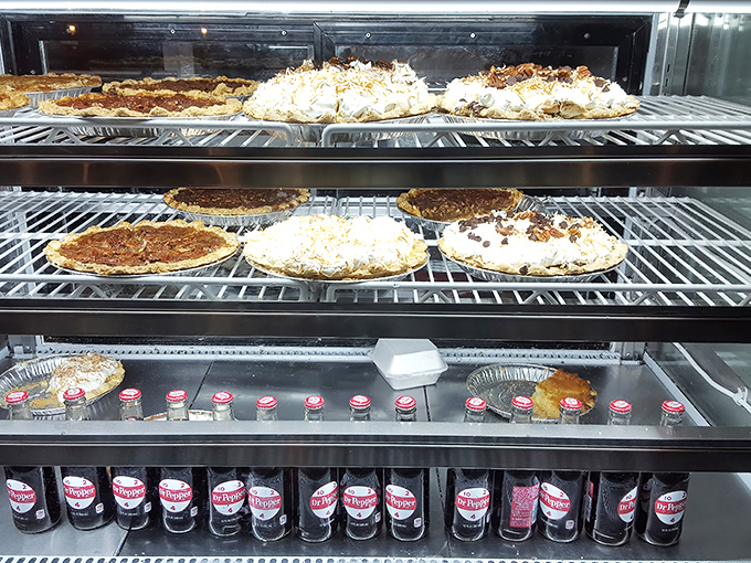 The dessert case&mdash;where willpower goes to die. Those pies aren't just baked, they're engineered for maximum happiness delivery.