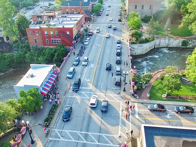 From above, the village reveals its perfect composition&mdash;a waterfall at its heart, historic buildings lining its streets, and nature embracing it all.