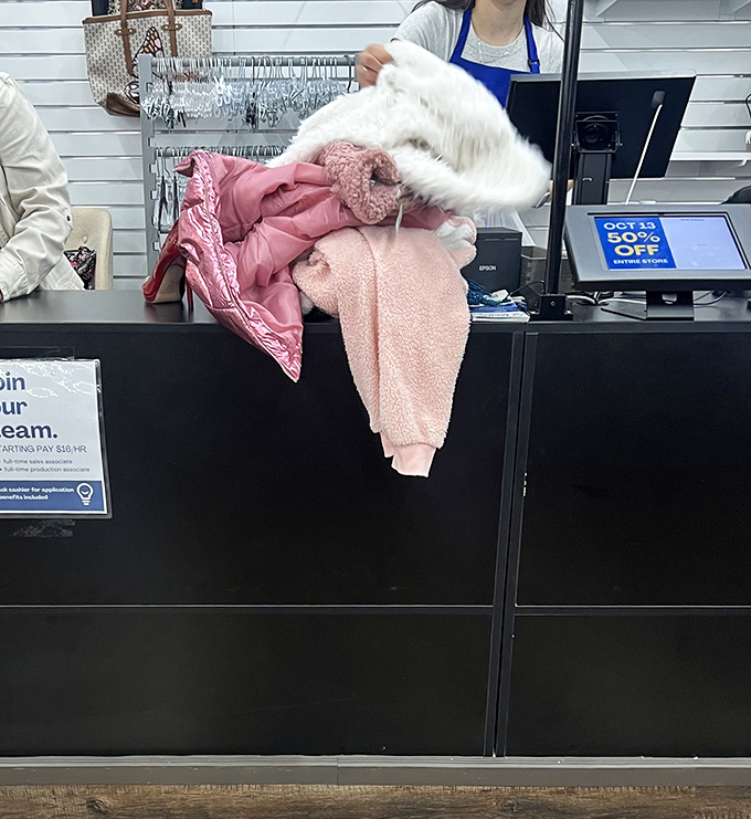The checkout counter: final destination for treasures before they begin their new lives. That 50% off sign is music to any bargain hunter's ears.