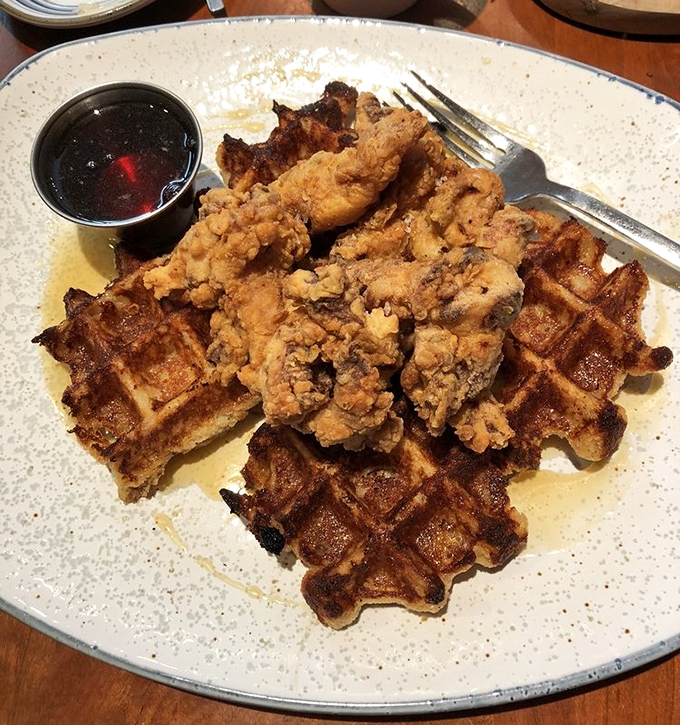 Chicken and waffles: the breakfast equivalent of a power couple. Crispy, juicy chicken perched atop golden waffles with maple syrup nearby&mdash;a relationship that was meant to be.