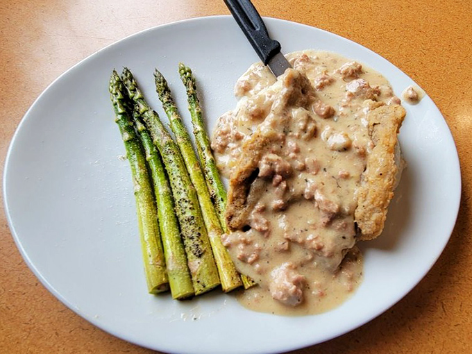 Chicken fried steak dressed in country gravy &ndash; proof that sometimes the best things in life are beige and beautiful.