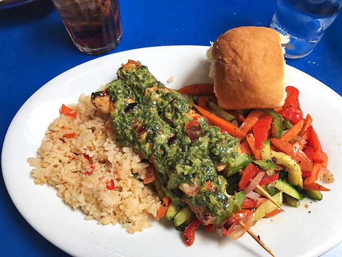 A plate that proves healthy can be exciting&mdash;vibrant vegetables, perfectly grilled protein, and rice that's absorbed all the right flavors. Vacation on a plate.