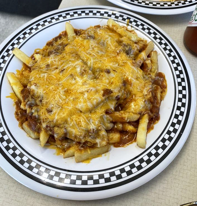 Chili cheese fries that could settle family feuds&mdash;a glorious mess of crispy potatoes, savory chili, and a blanket of melted cheese.