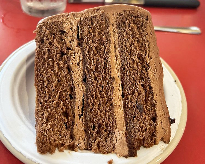 Chocolate cake so rich and decadent it should come with its own tax bracket&mdash;layers of cocoa perfection that demand to be savored.