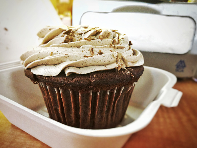 This chocolate cupcake isn't trying to reinvent dessert—it's just executing it perfectly, like a familiar song that still gives you goosebumps.