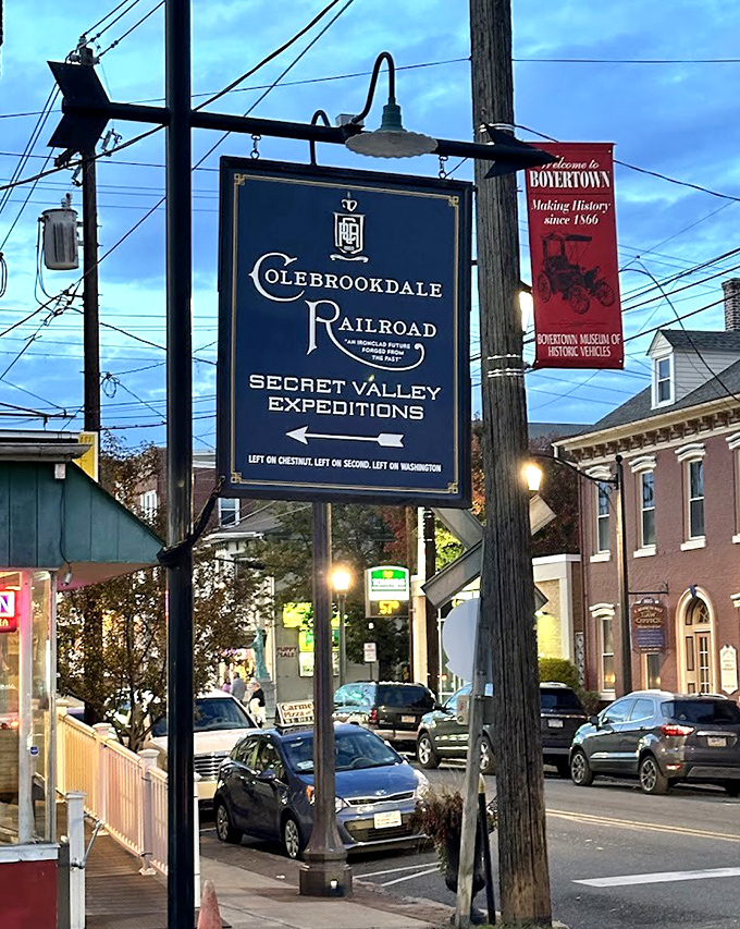 Follow the arrow to adventure! This vintage sign points the way to Colebrookdale's Secret Valley Expeditions, promising journeys beyond the ordinary.