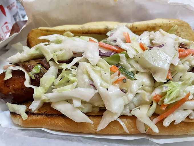 This slaw-topped sausage is wearing more layers than an Ohio resident in February. The crisp vegetables provide the perfect counterpoint to the savory meat.