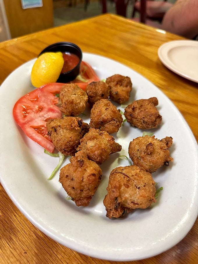 Conch fritters golden-brown and crispy on the outside, tender within &ndash; a taste of the Bahamas that found its perfect home in the Florida Keys.