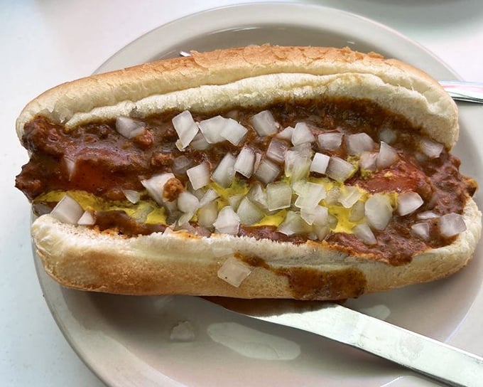 Behold the anatomy of perfection: steamed bun, snappy dog, seasoned chili, sharp onions, and yellow mustard&mdash;Detroit's most perfect equation.