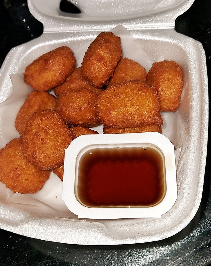 Corn nuggets that look like golden treasure chests of flavor. These crunchy bites prove that sometimes the best things come in small packages.