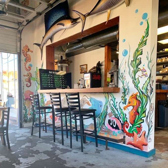 Counter seating puts you front-row for the culinary show. Those seahorse murals aren't just decoration&mdash;they're your dining companions.